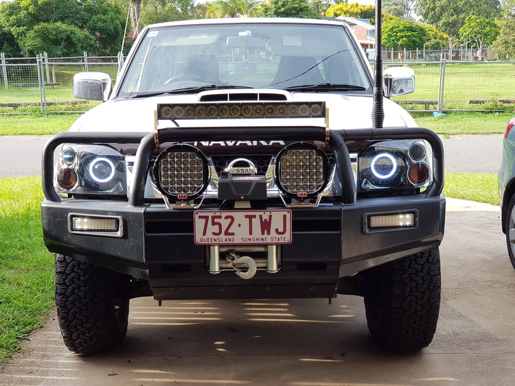 Nissan Navara D22 Headlights with White/Amber Halo Rings