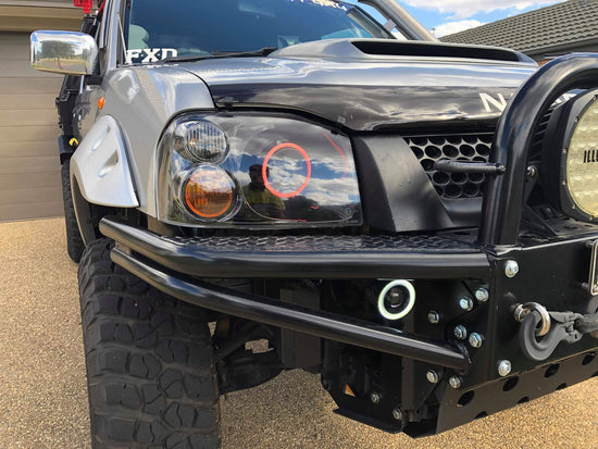 Nissan Navarra D22 Headlights with Multicoloured Halo Rings | Dan's ...